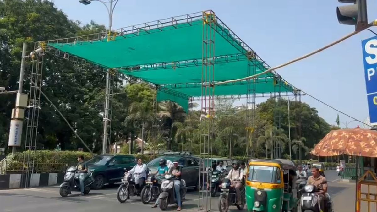 Surat Police Beat the Heat with Green Traffic Signal Nets - The Blunt Times